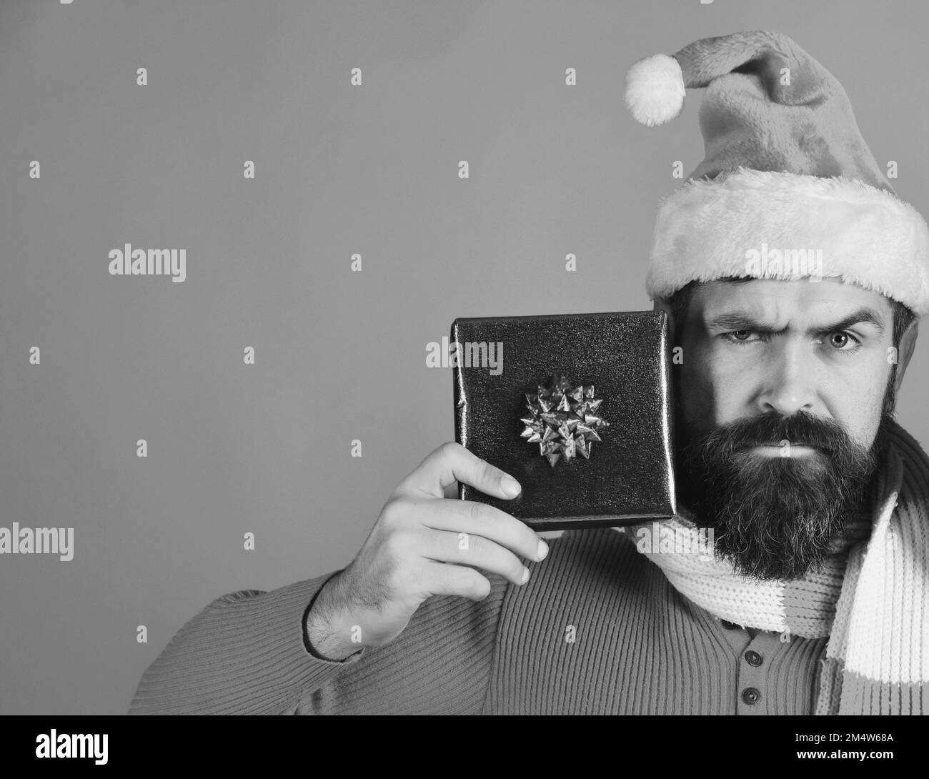 Holds gift box in Black and White Stock Photos & Images - Alamy