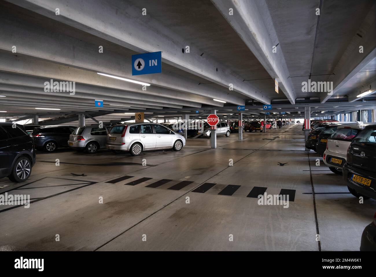 Sign in a car garage with directions for public hi-res stock ...
