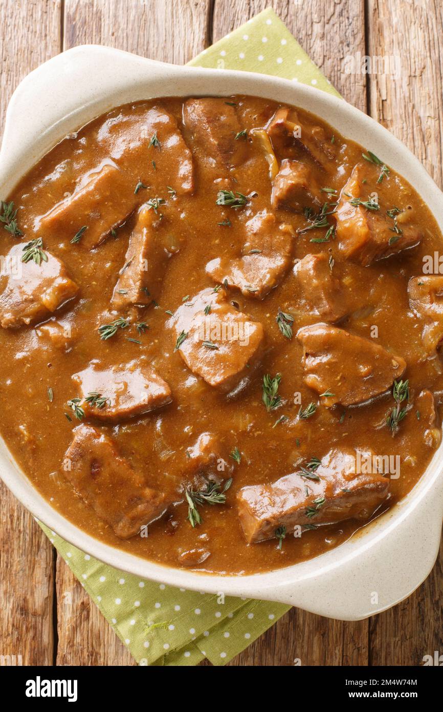 Carbonnade a la Flamande Flemish Beef Stew closeup on the pot on the ...
