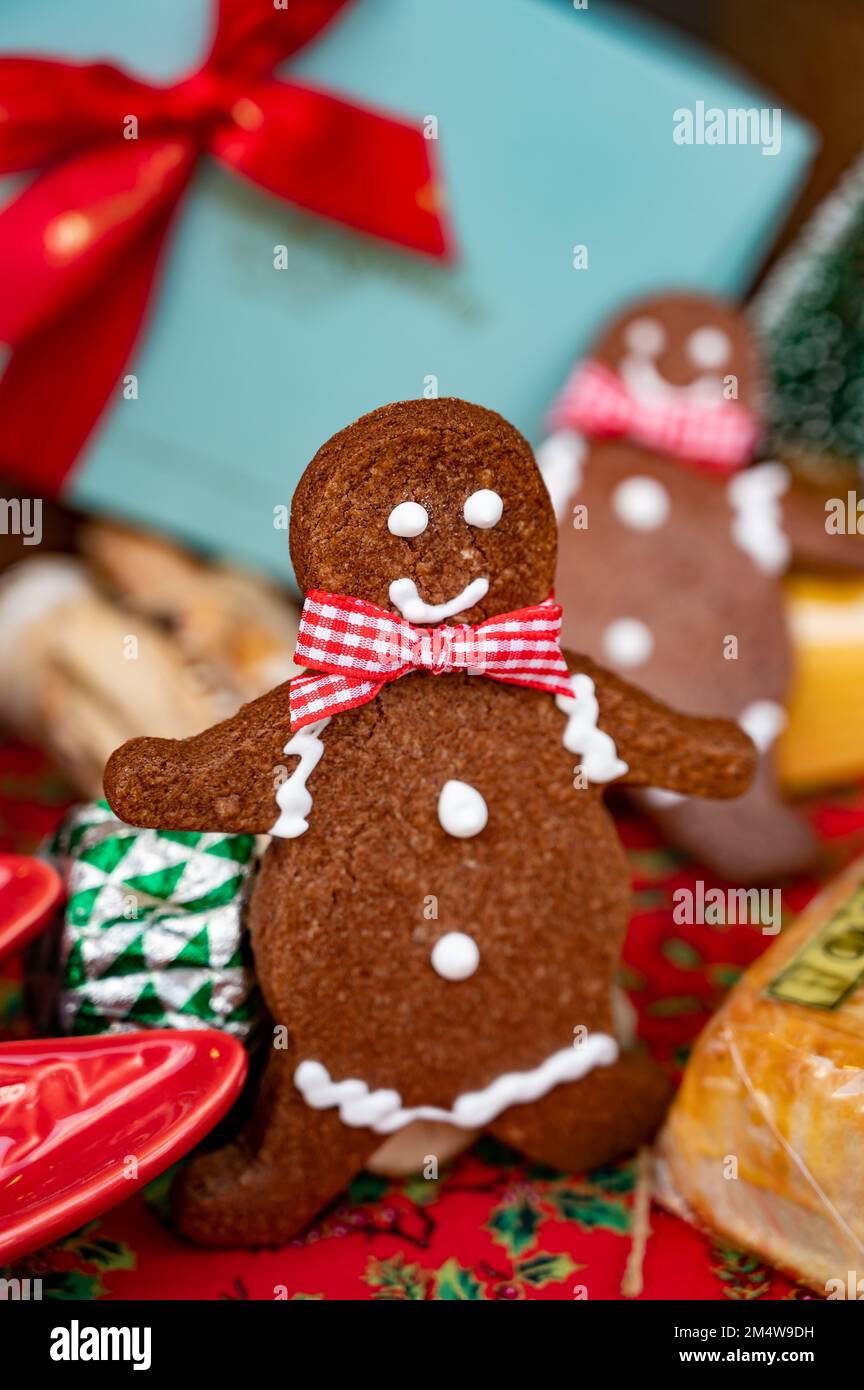 Smiling fresh baked gingerbread man on display in artisan bakery in ...