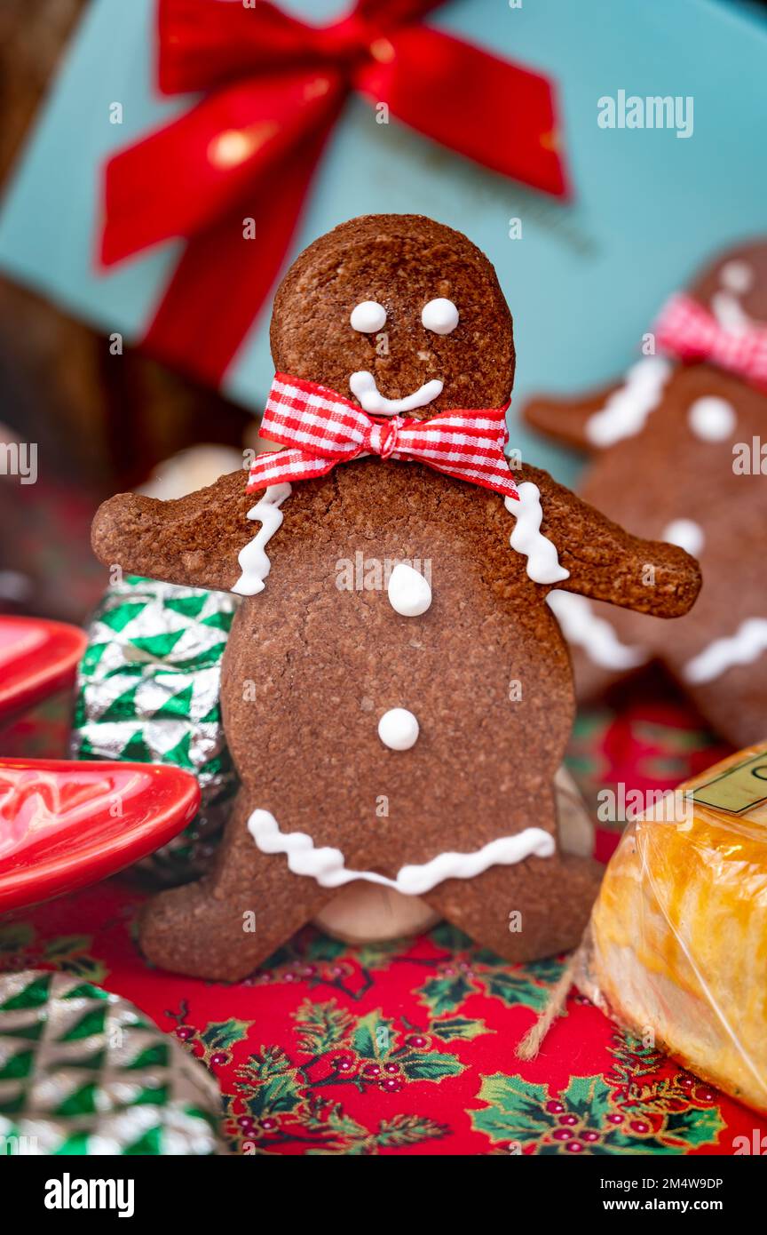 Smiling fresh baked gingerbread man on display in artisan bakery in ...