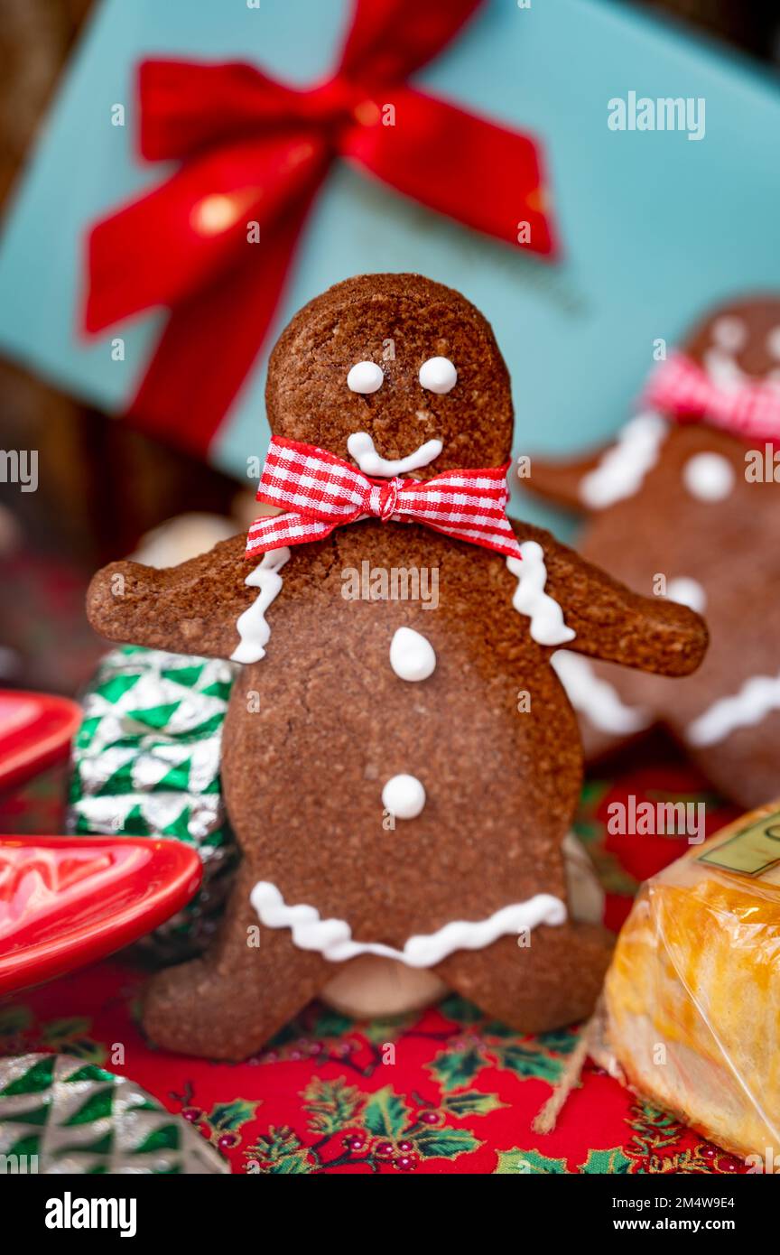 Smiling fresh baked gingerbread man on display in artisan bakery in ...