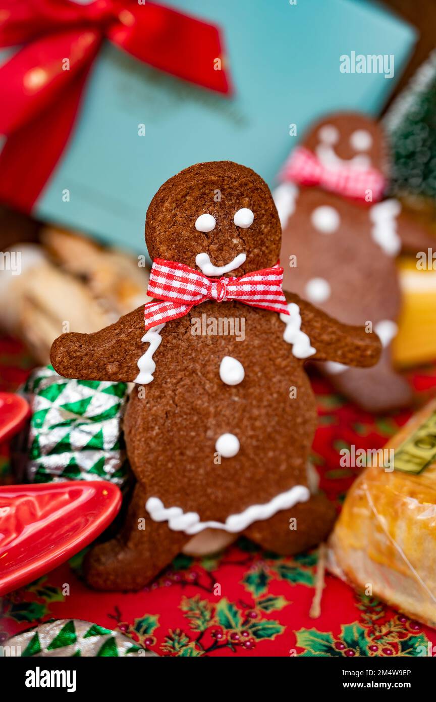 Smiling fresh baked gingerbread man on display in artisan bakery in ...