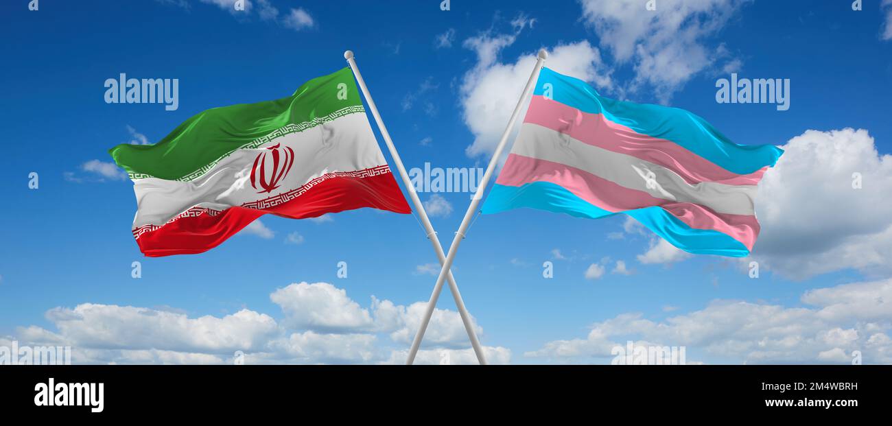 two crossed flags transgender Pride and Iran waving in wind at cloudy ...