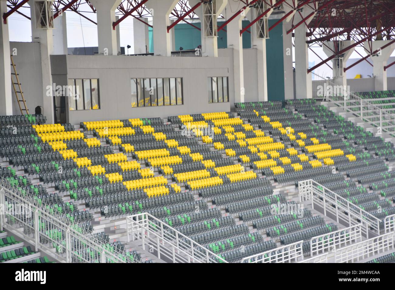 empty top row seat with letter color combination in a football soccer ...