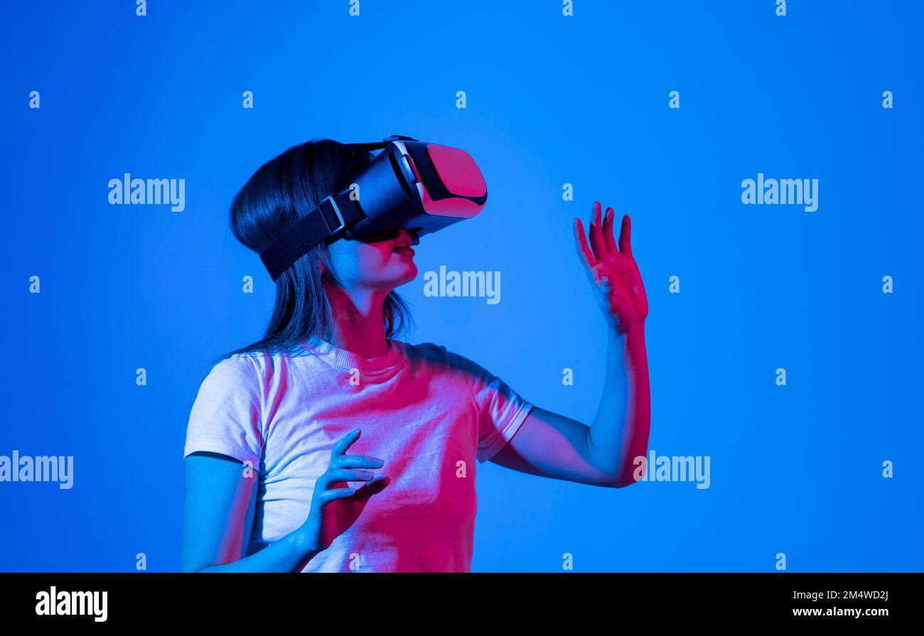 Young Brunette Woman In White T Shirt Wearing Vr Headset Metaverse