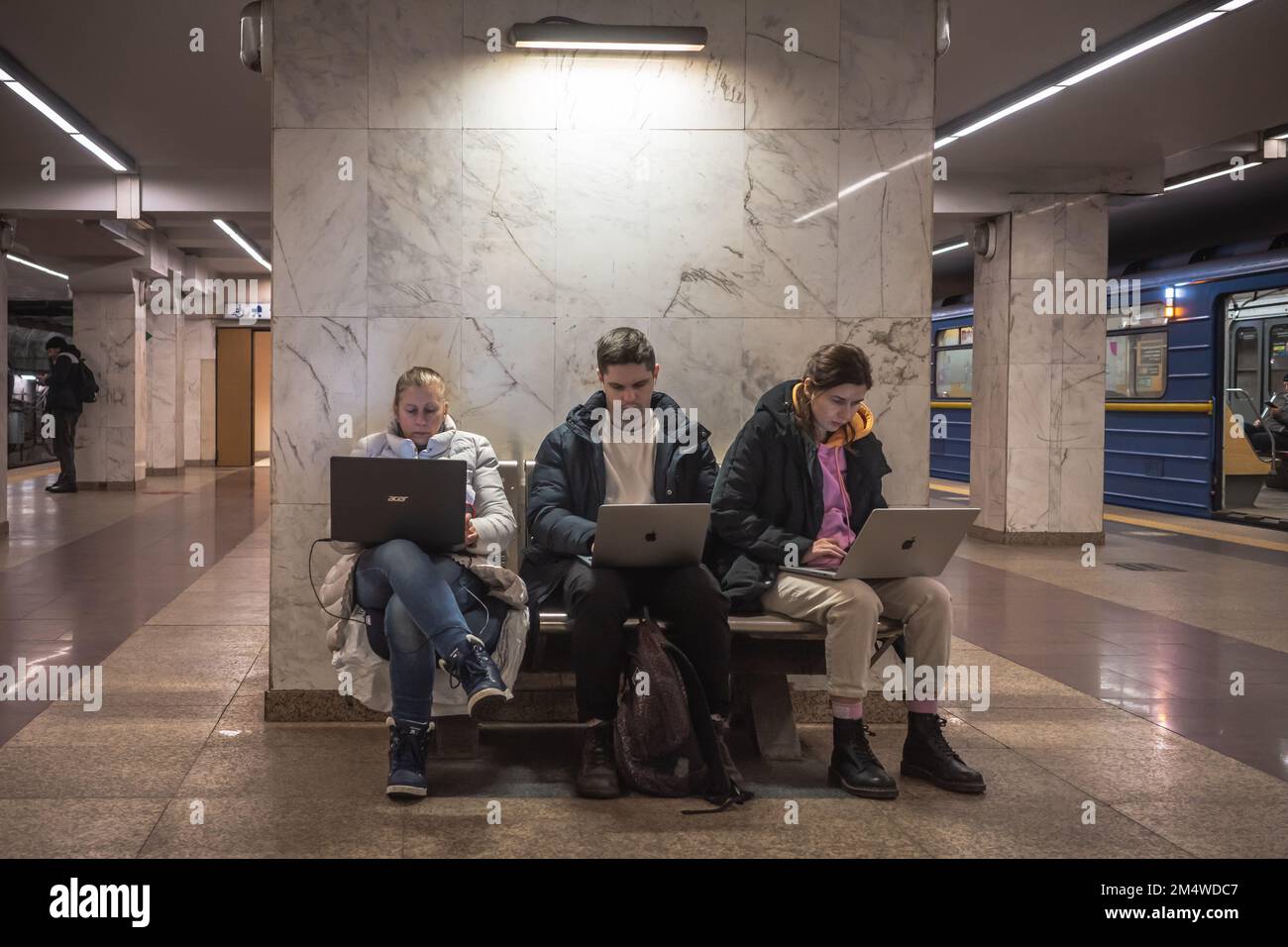 KYIV, UKRAINE - Dec. 16, 2022: Young people work on computers at a ...