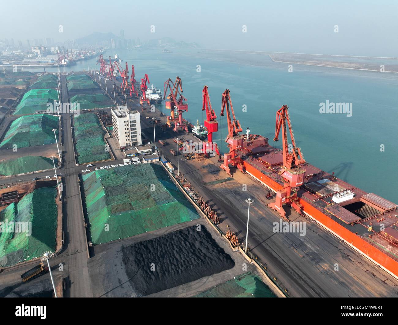 Aerial photo shows the ship unloading thermal coals at coal terminal of ...