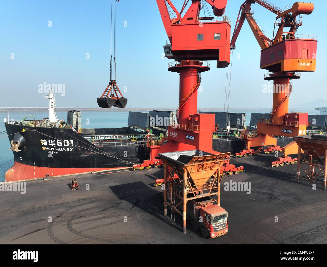 Aerial photo shows the ship unloading thermal coals at coal terminal of ...