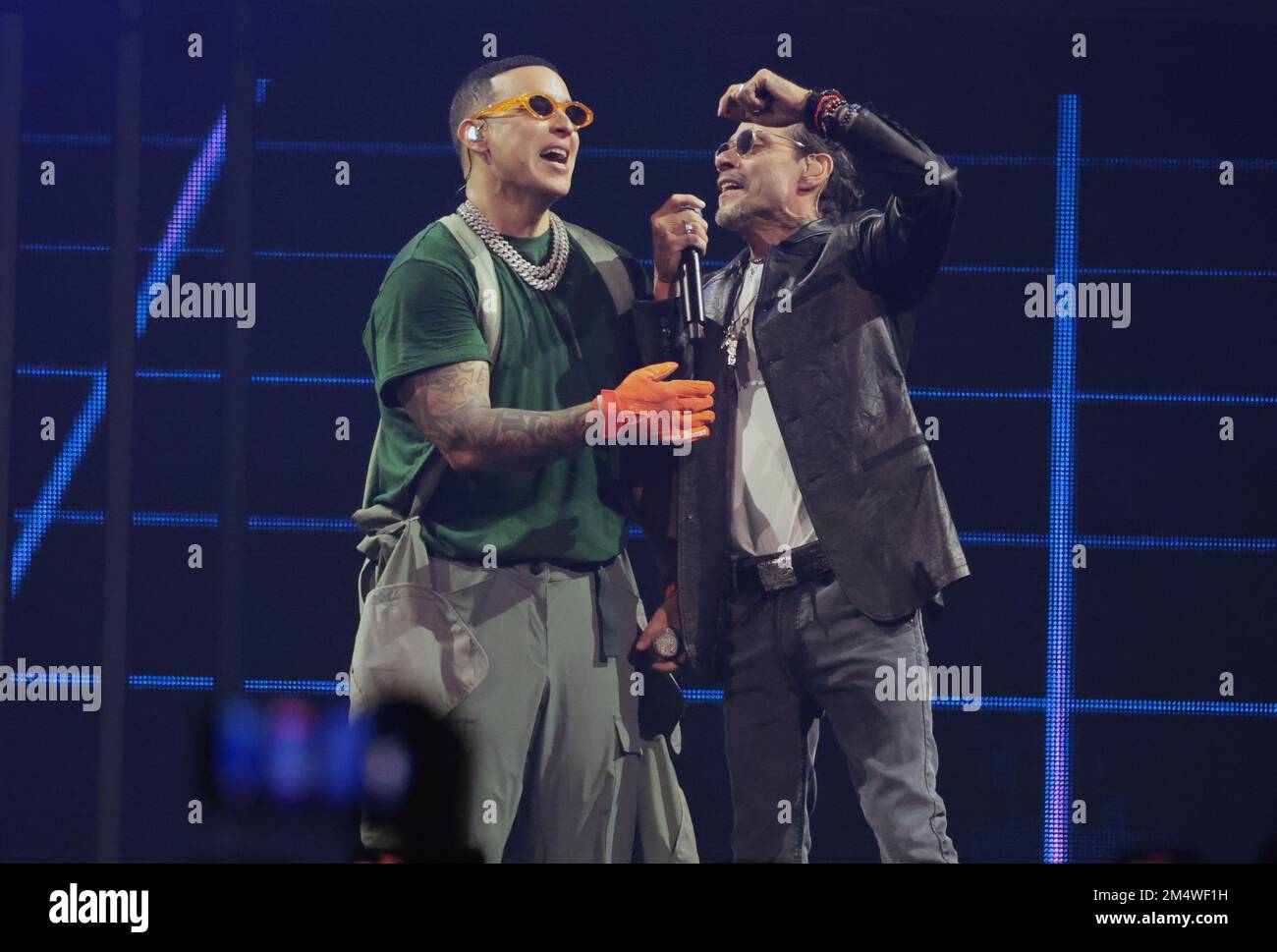 Miami, United States. 22nd Dec, 2022. Daddy Yankee (L) performs on ...