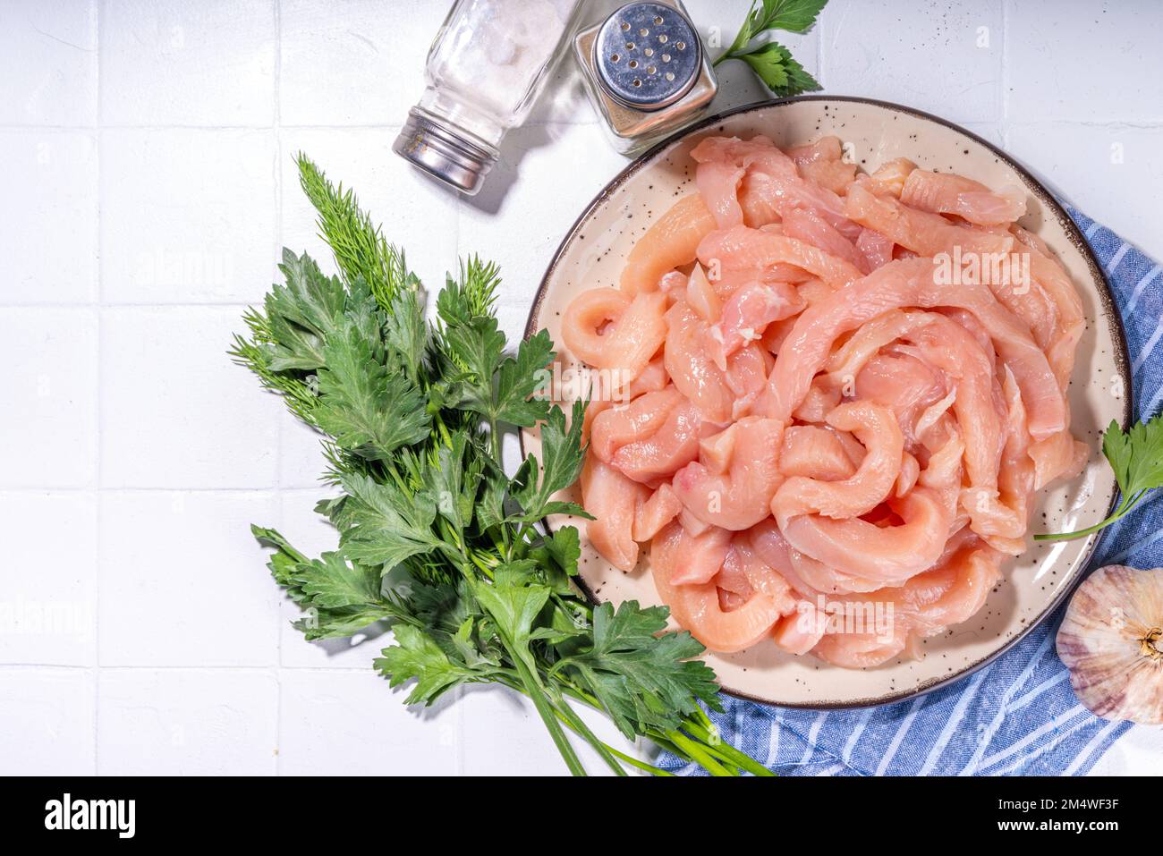 Cooking diet white poultry meat background. Fresh sliced chicken strips ...