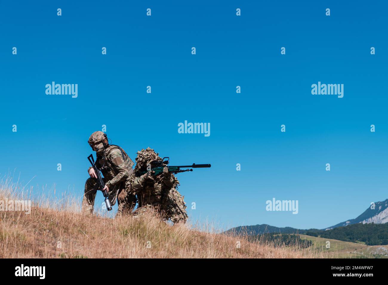 A sniper team squad of soldiers is going undercover. Sniper assistant ...