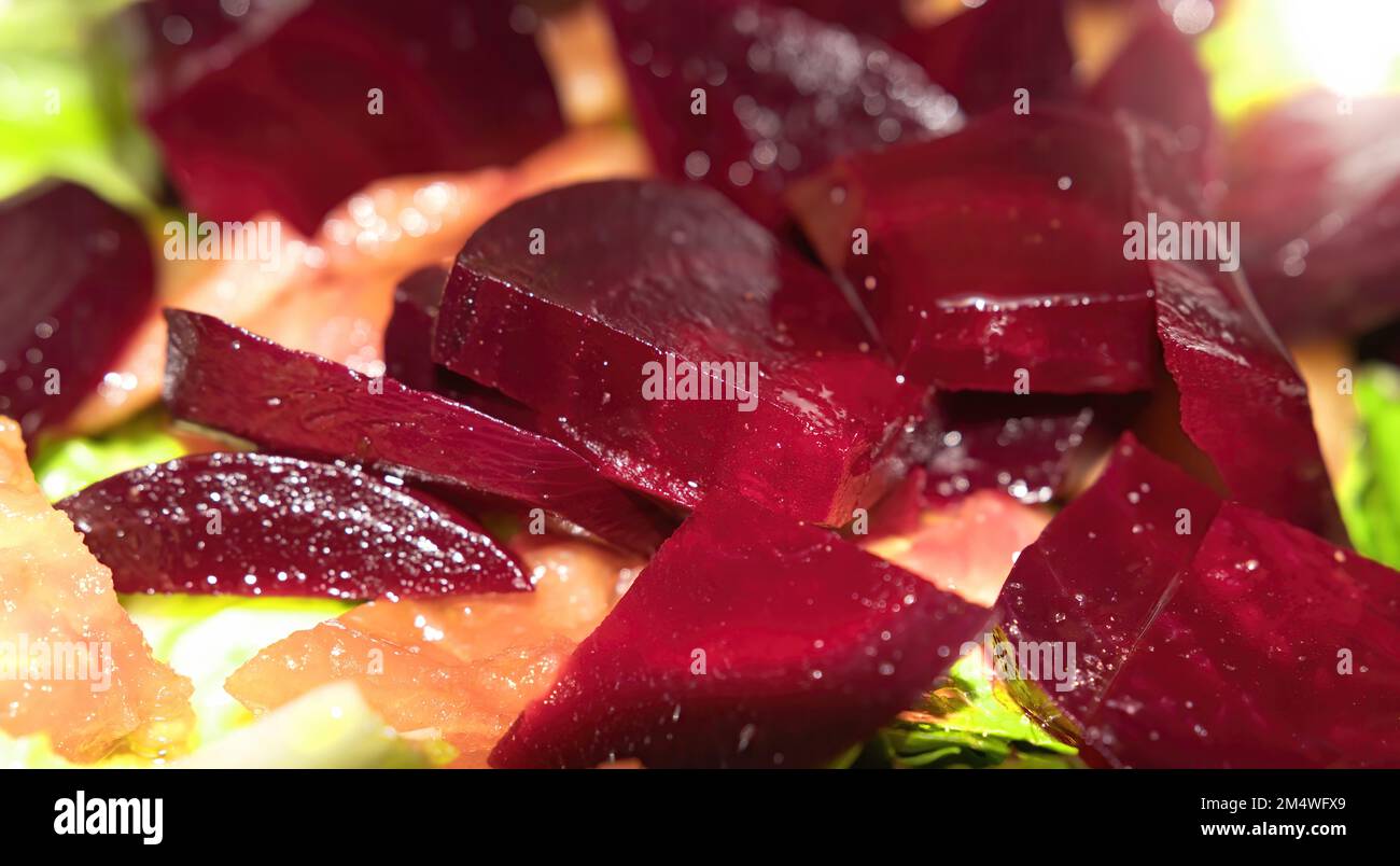 A plate of sweet red beetroot, sliced as a garnish Stock Photo - Alamy