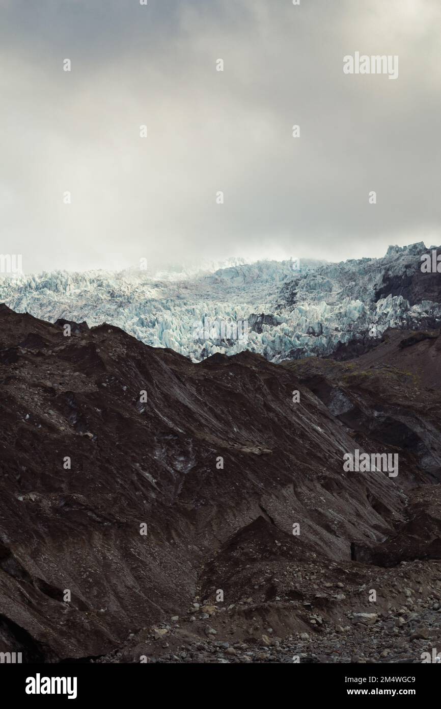 Steep cliffs covered with snow landscape photo Stock Photo - Alamy