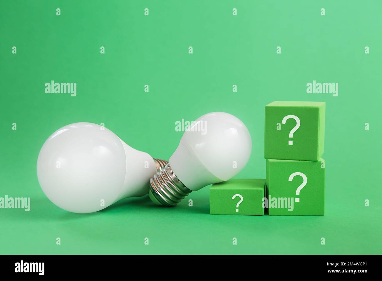 Light bulb, question mark on green background. Concept of competition ...