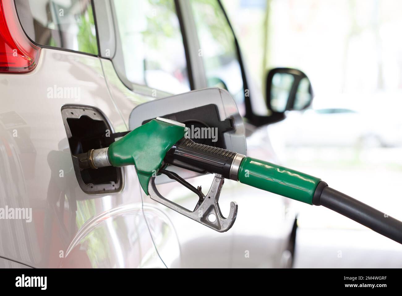 Close up of fuel pump nozzle inside the fuel filler of a car Stock ...