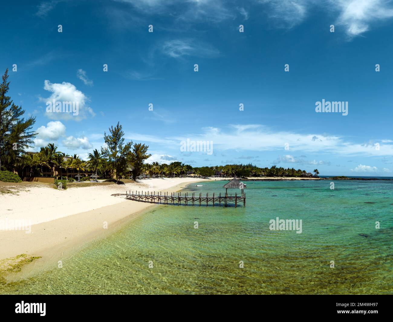 Idillic wood pier in a beach. tropical green area amazing calm mood ...