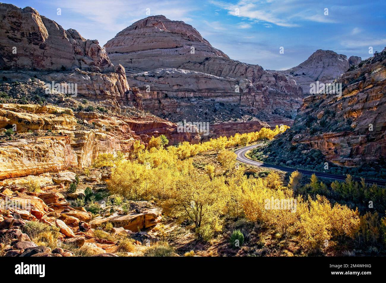 Highway 24 and the Freemont River carve through Capitol Reef National ...