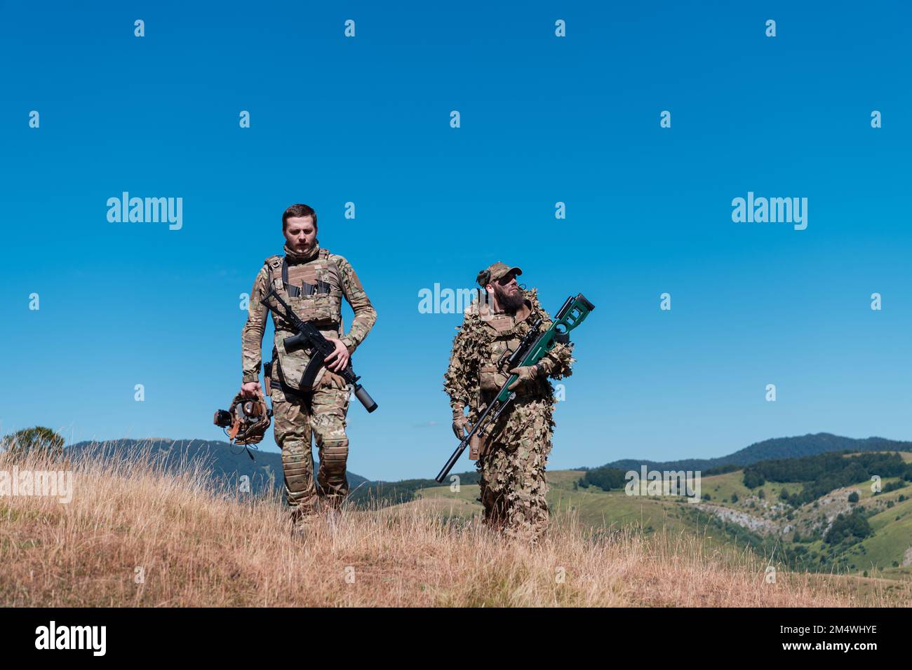 A sniper team squad of soldiers is going undercover. Sniper assistant ...