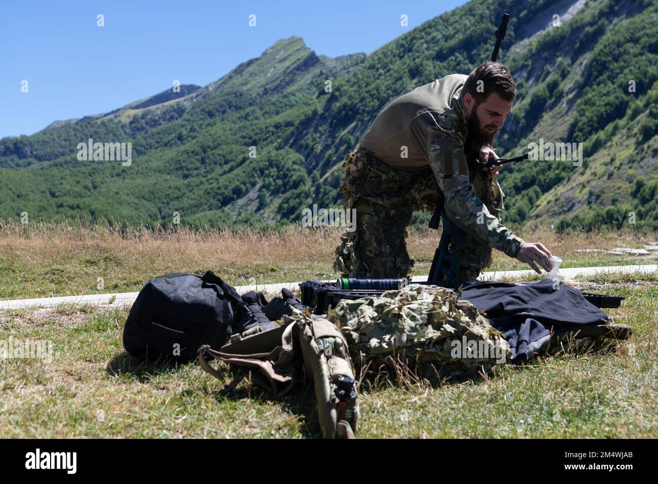 Special operations soldiers team preparing tactical and communication ...