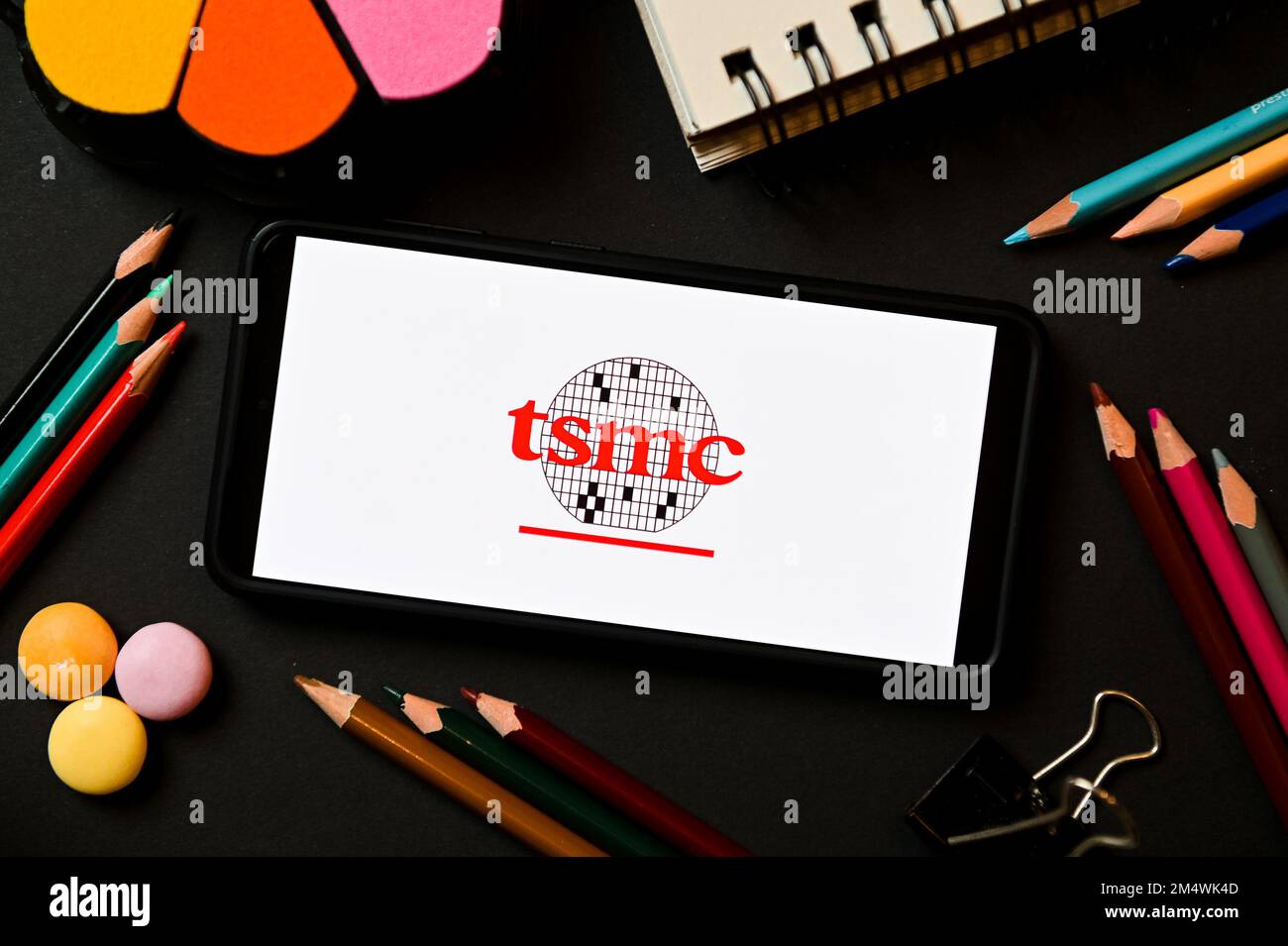 In this photo illustration a TSMC logo seen displayed on a smartphone ...