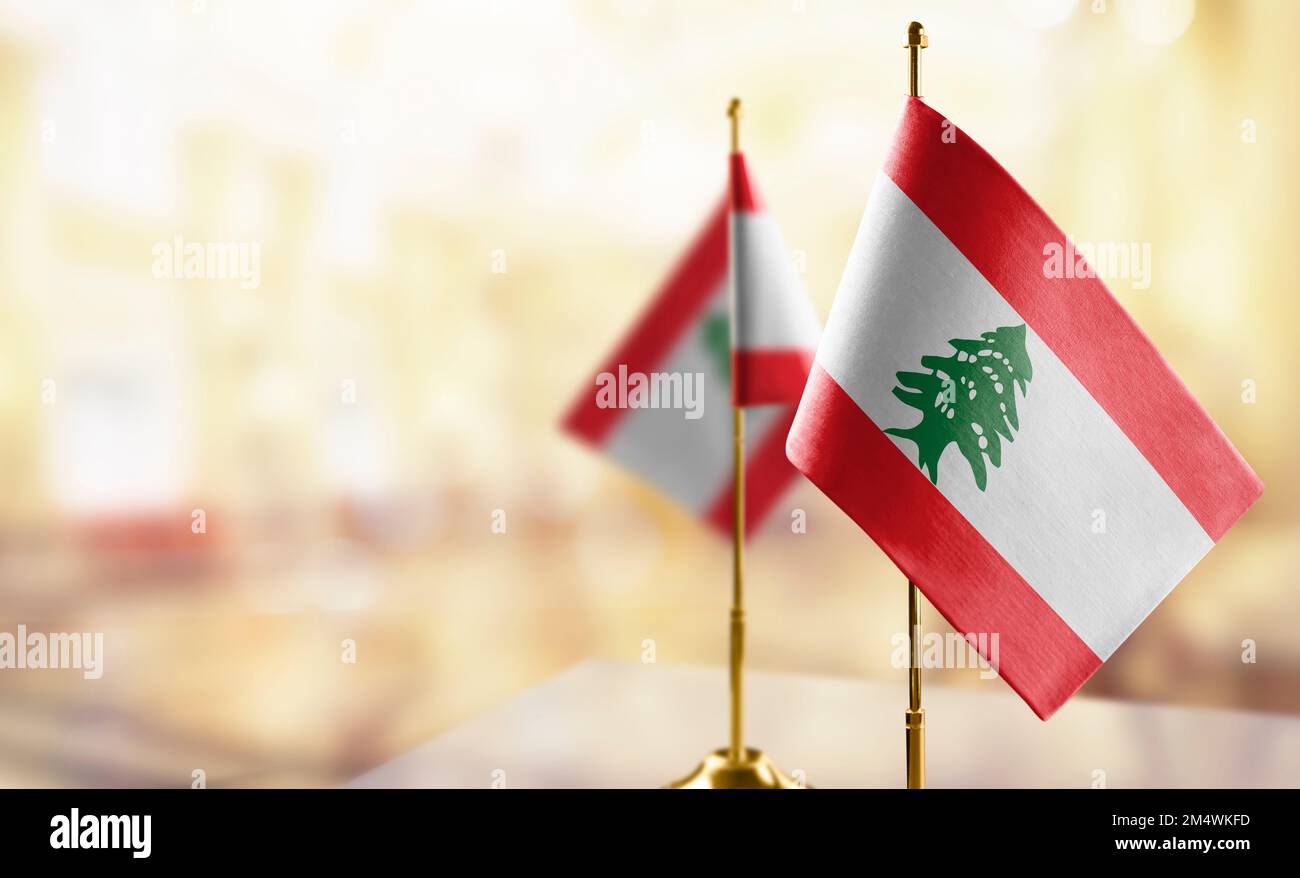 Small flags of the Lebanon on an abstract blurry background Stock Photo ...