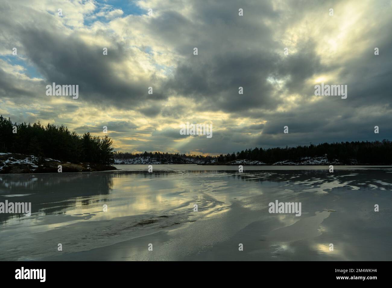 Reflective ice in Laurentian Lake, Greater Sudbury, Ontario, Canada ...