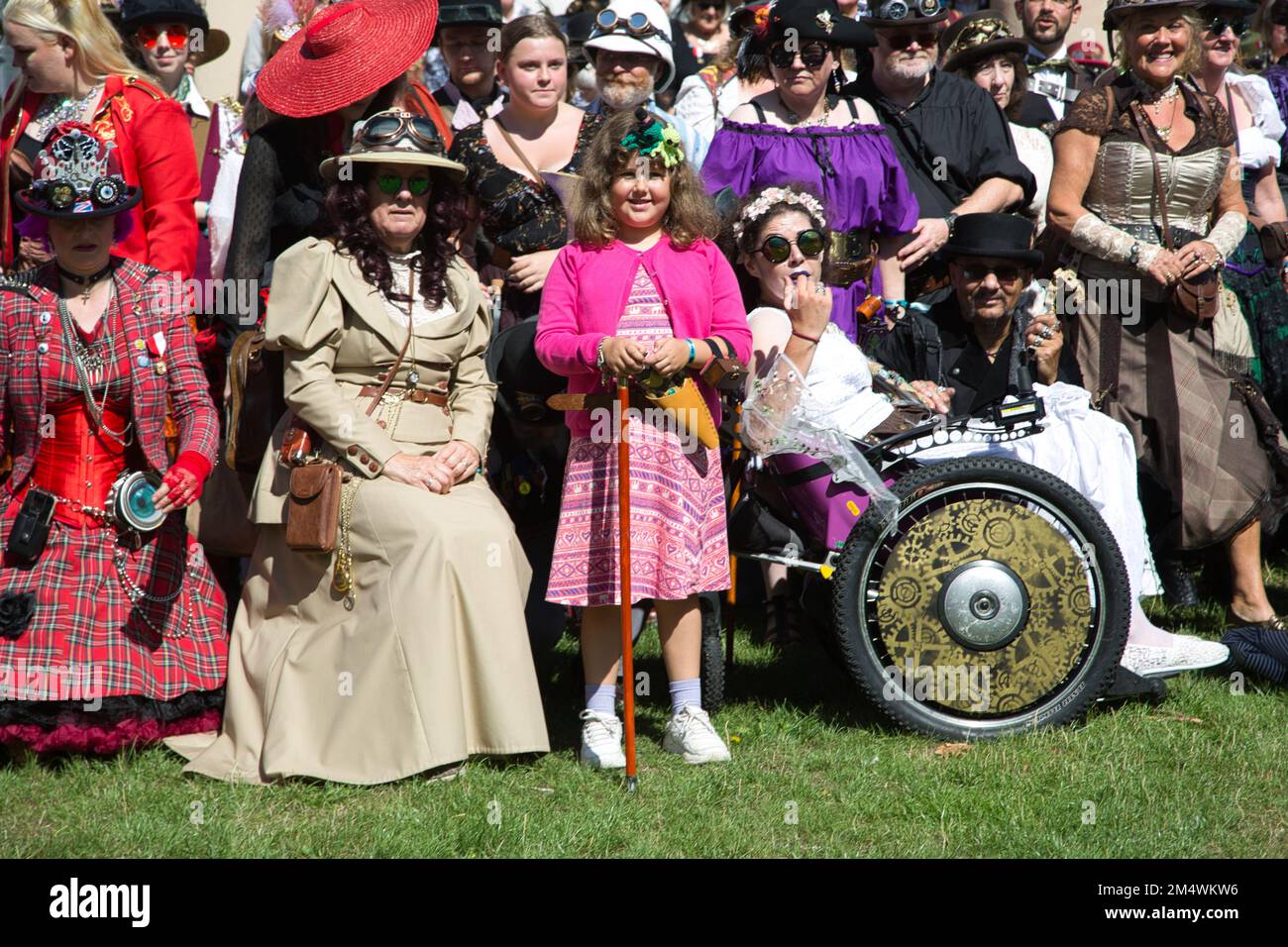 people celebrating a cultural day under sunny sky on grass field Stock ...