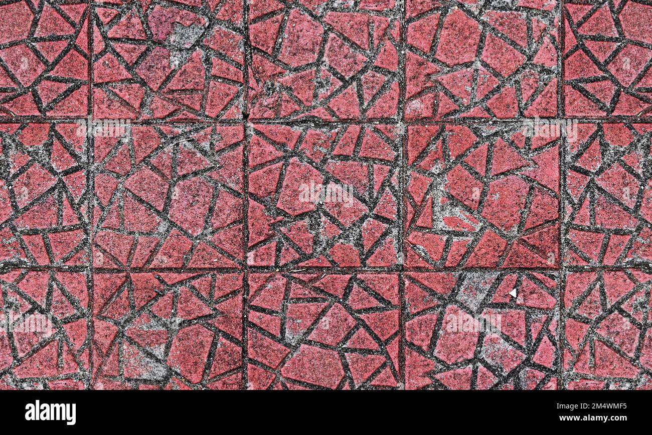 Red textured concrete blocks on floor Stock Photo - Alamy