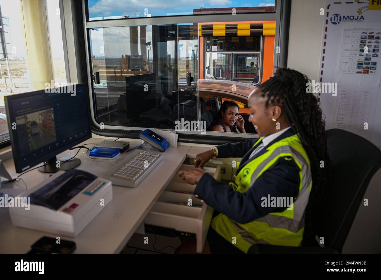 Nairobi, Kenya. 22nd Dec, 2022. A driver pays at a toll station on the ...