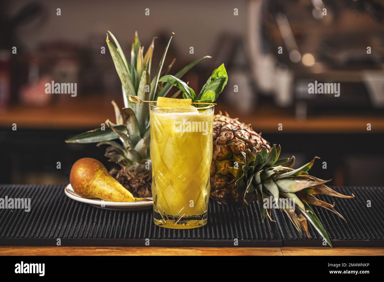 Still life of glass with cold fresh pineapple smoothie Stock Photo - Alamy