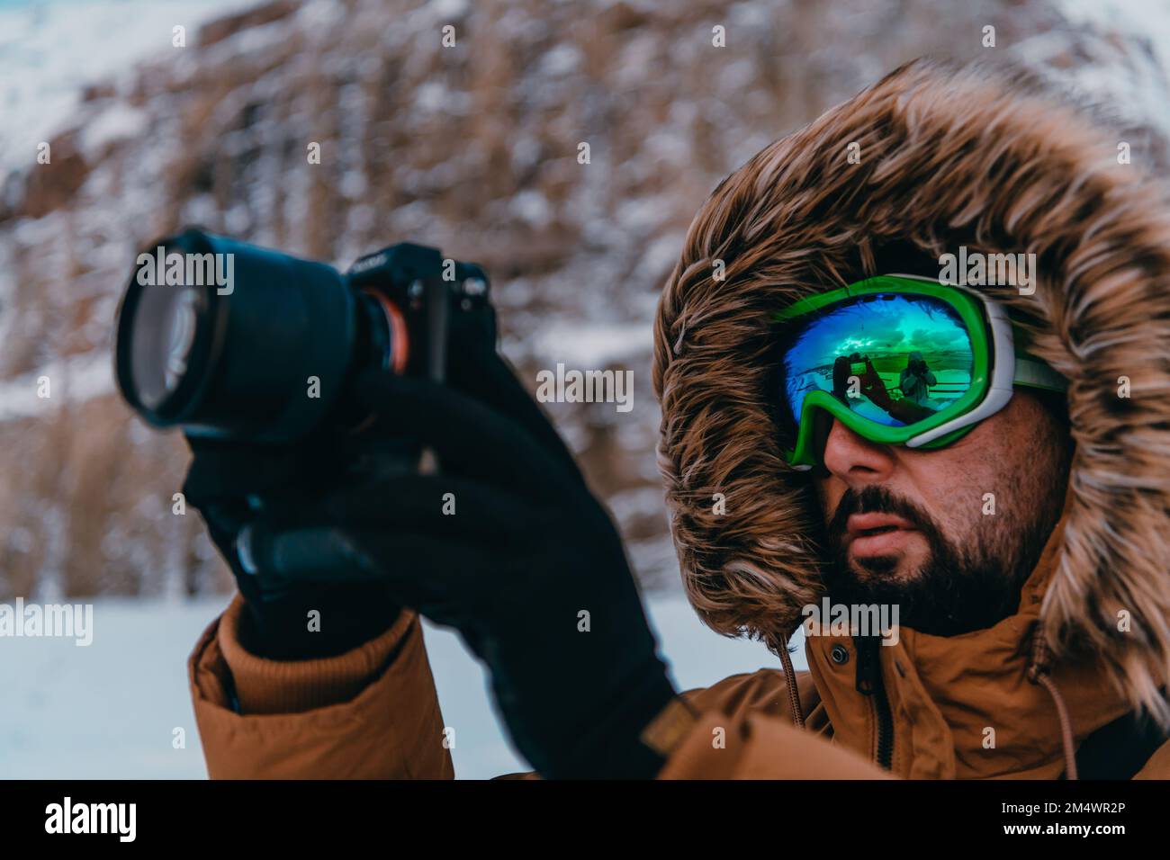 A photographer in the cold Skavdinava regions tries to take a photo for ...