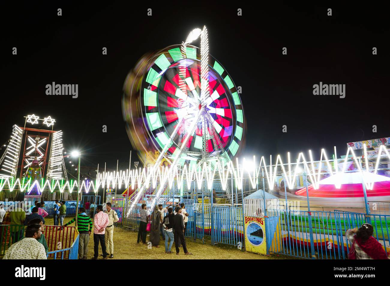 Long Exposure slow shutter speed Shot of a Spinning Ferris Wheel with ...