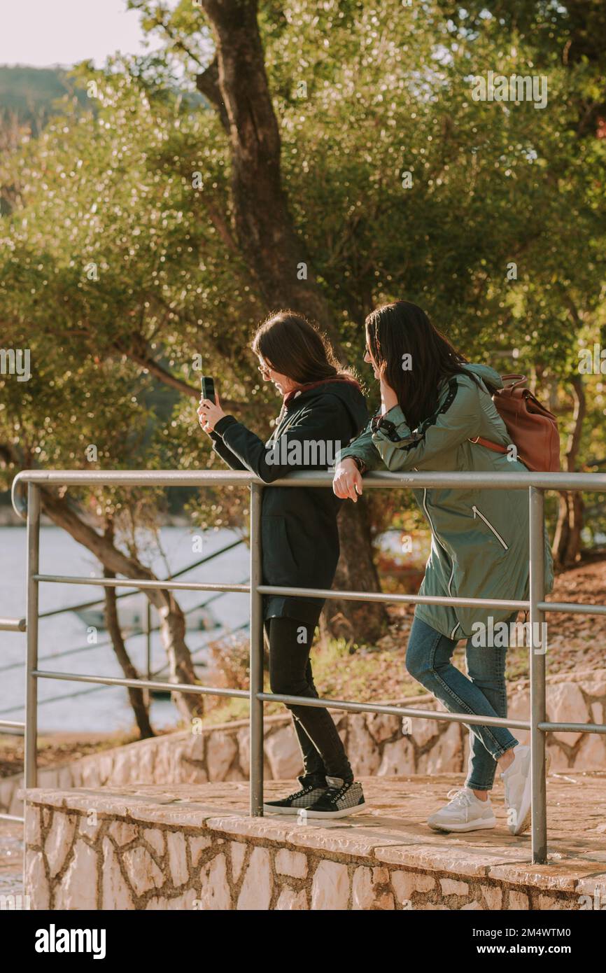 Woman from behind walking path jeans hi-res stock photography and ...