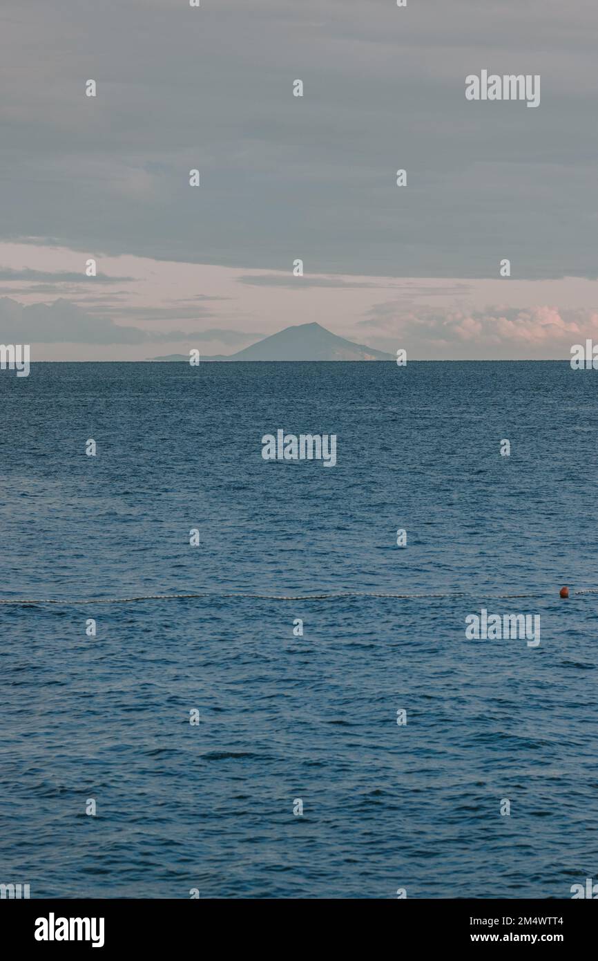 Island in the middle of the sea Stock Photo - Alamy