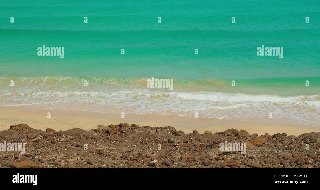 Meditative relax view of tender turquoise sea wave with white foam on ...