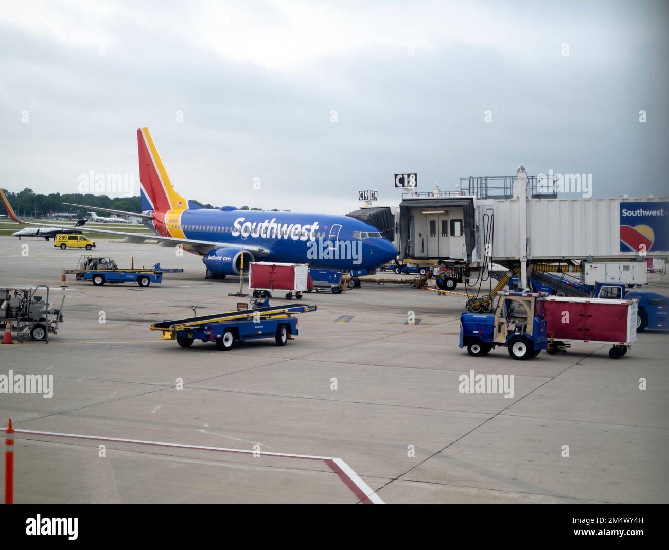 A Southwest Airlines plane sits at a gate at General Mitchell ...