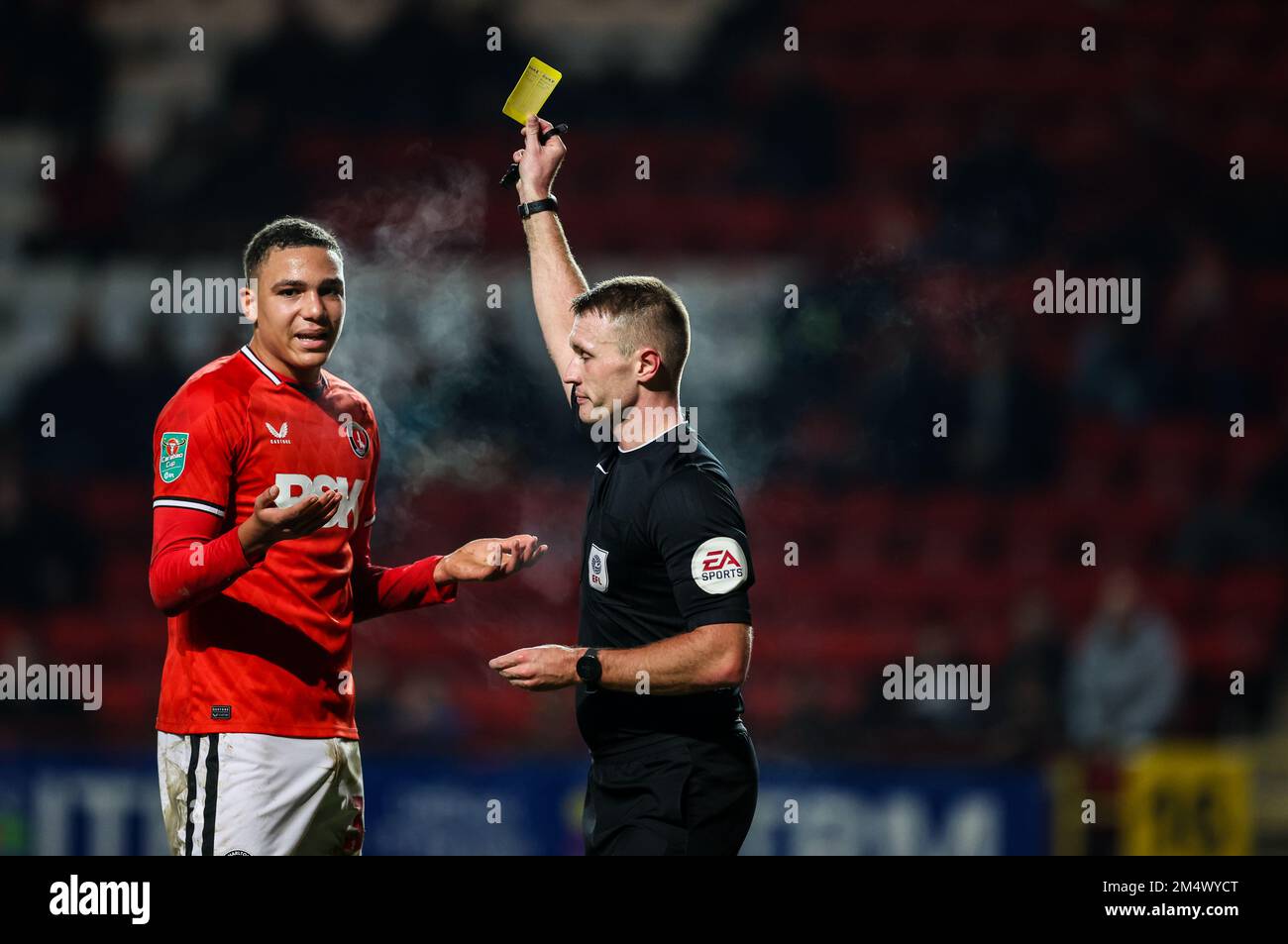 Charlton Athletic's Miles Leaburn is is shown a yellow card by by ...