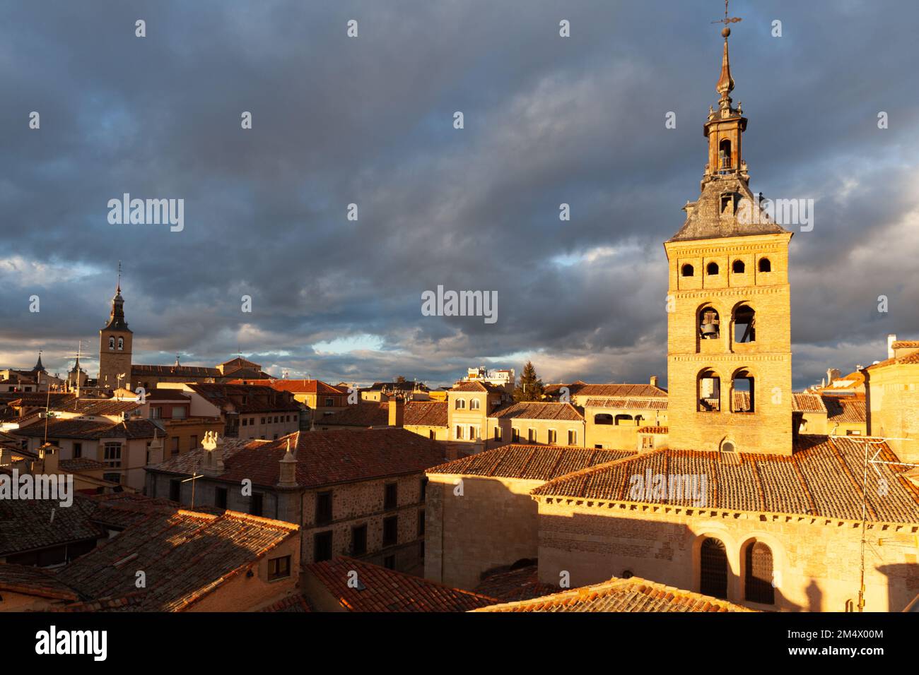 Segovia, Spain - 4 January 2021: San Martin Church bell tower at golden ...