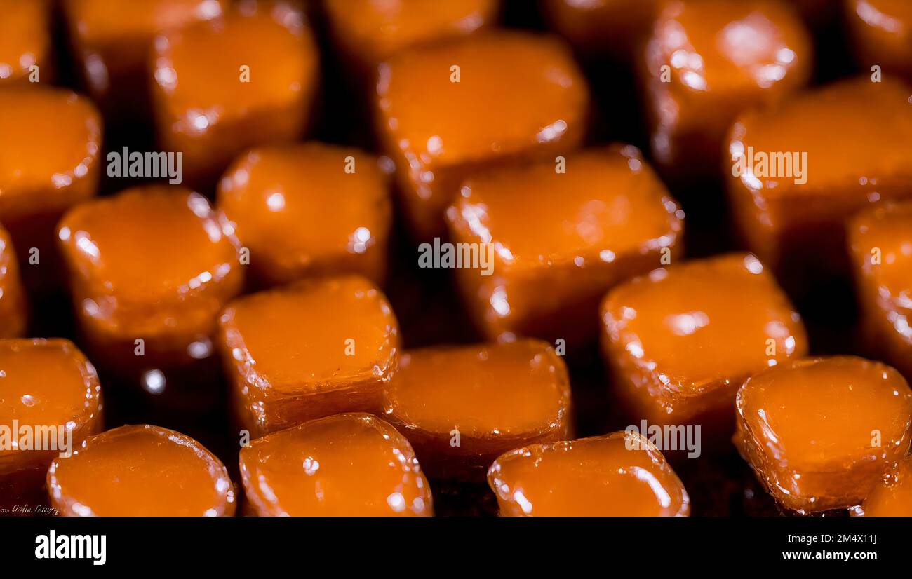 caramel candy in square blocks Stock Photo - Alamy