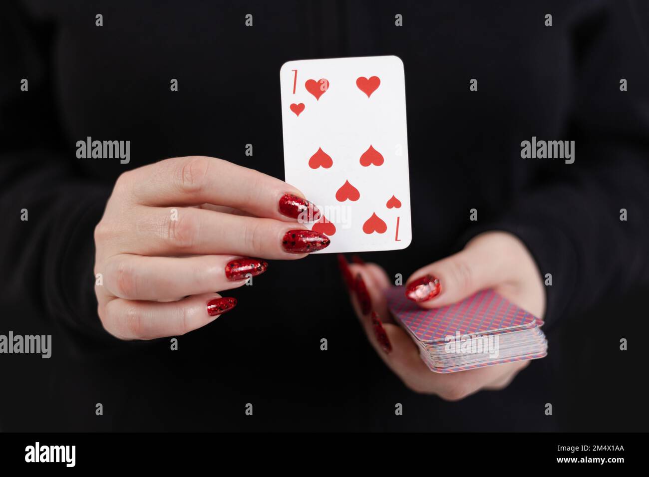 Female hands hold a deck of cards and show tricks Stock Photo - Alamy