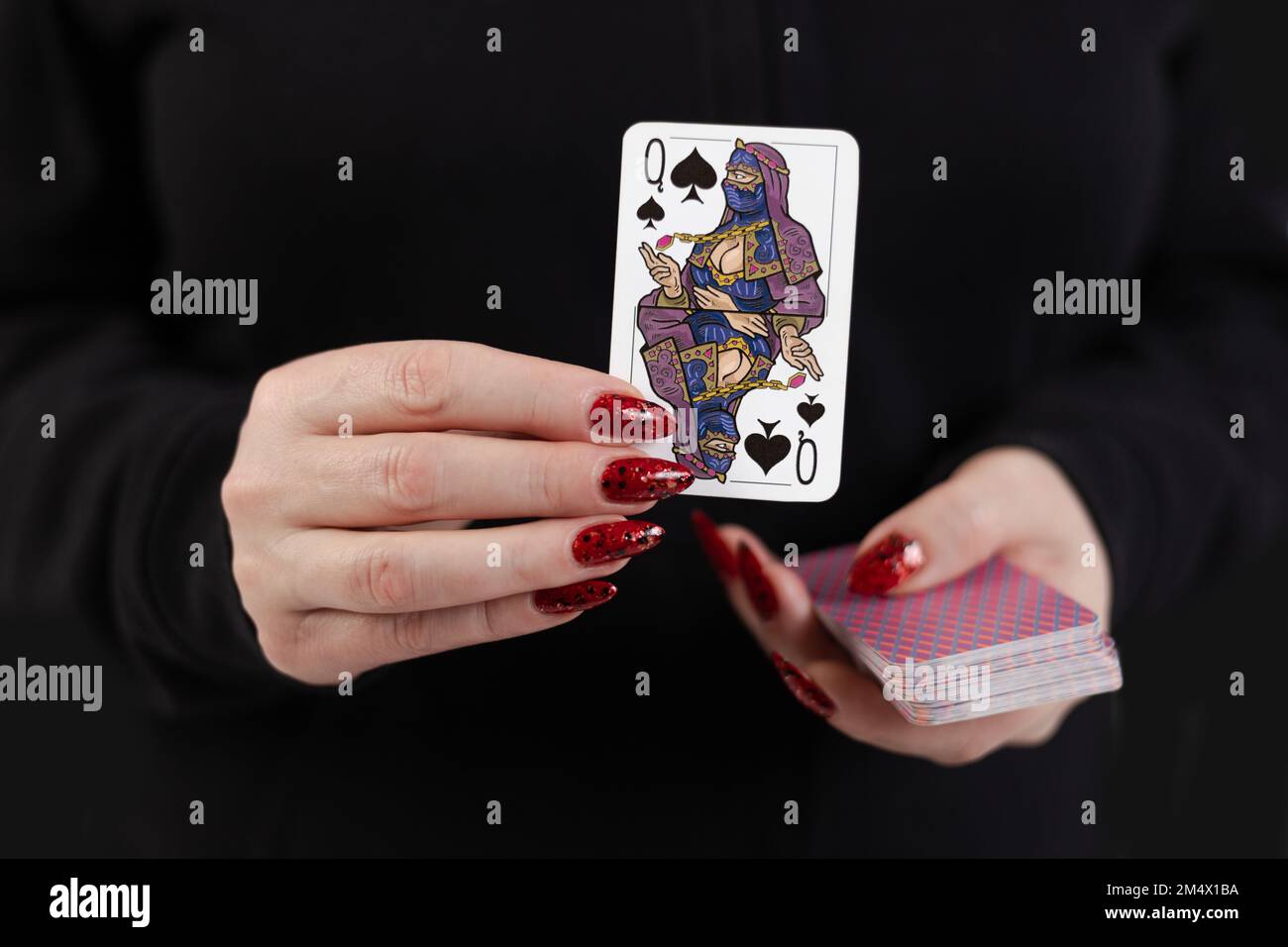 Female hands hold a deck of cards and show tricks Stock Photo - Alamy