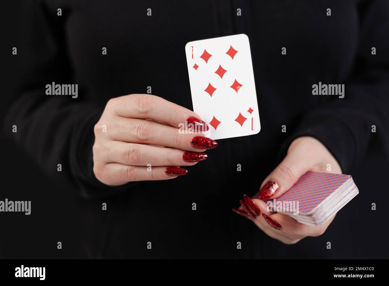 Female hands hold a deck of cards and show tricks Stock Photo - Alamy