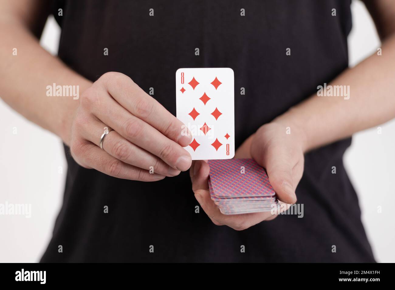 Man showing tricks with cards hi-res stock photography and images - Alamy