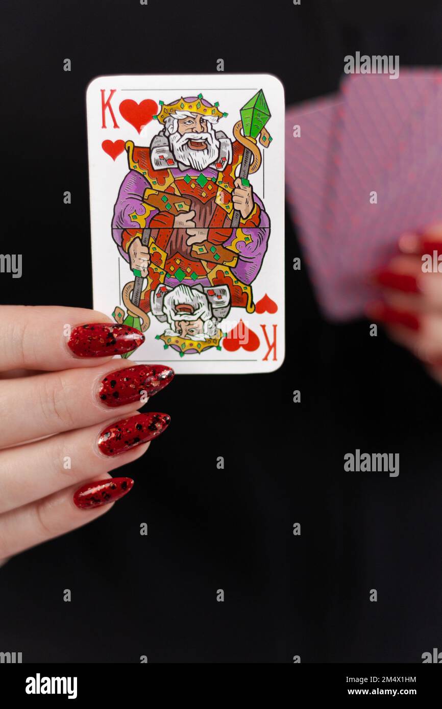 Female hands hold a deck of cards and show tricks Stock Photo - Alamy