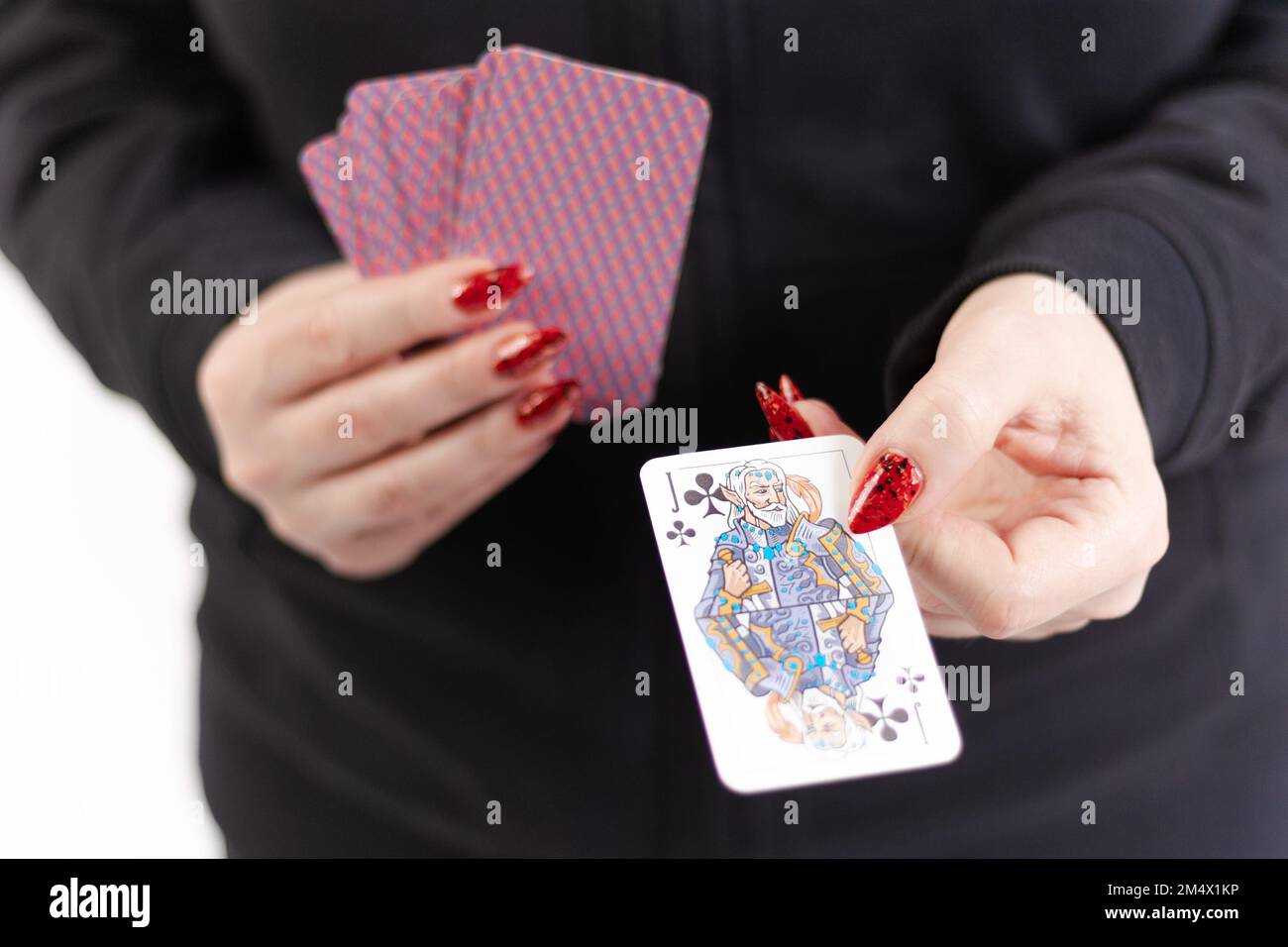 Female hands hold a deck of cards and show tricks Stock Photo - Alamy