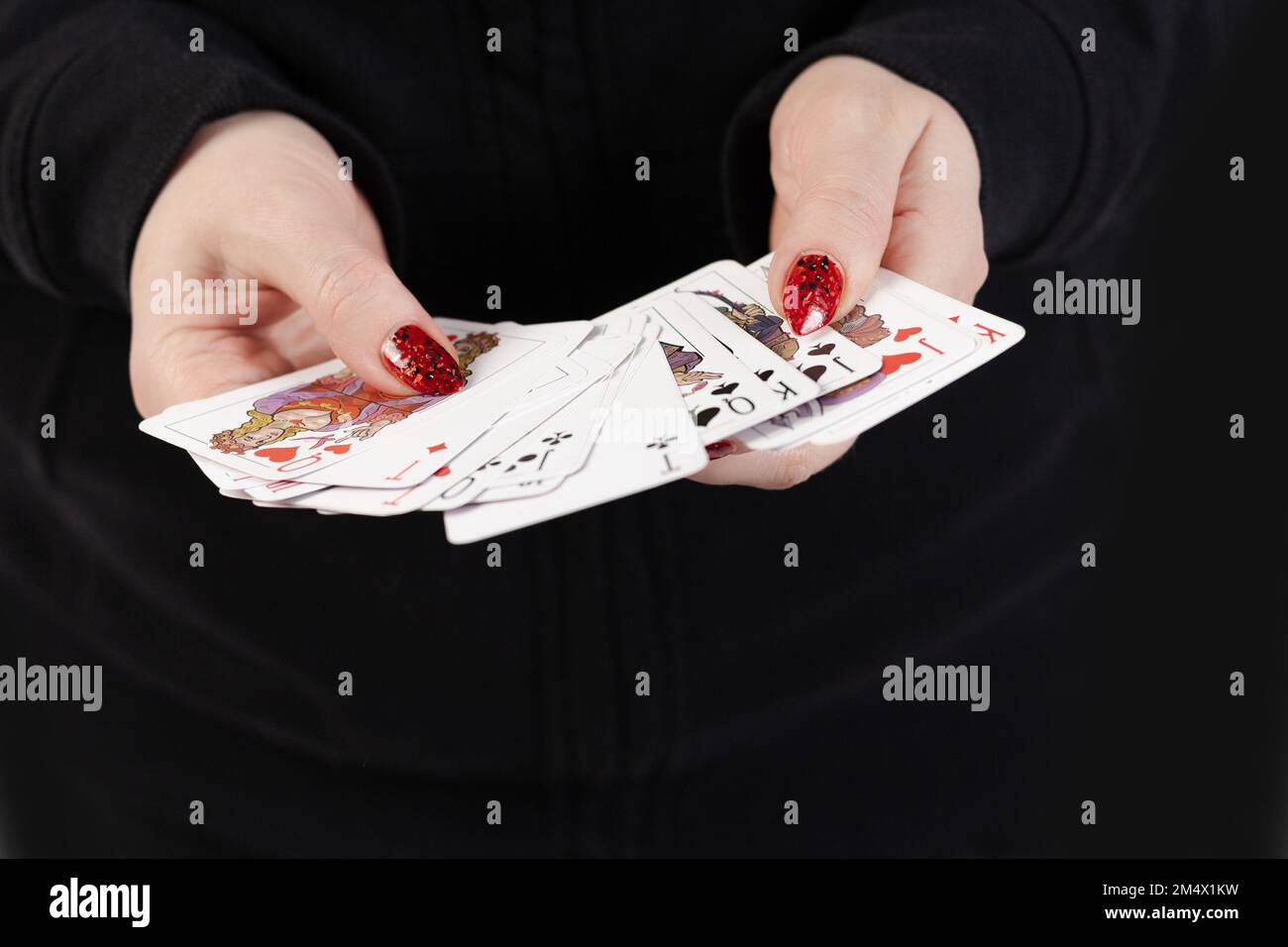 Female hands hold a deck of cards and show tricks Stock Photo - Alamy
