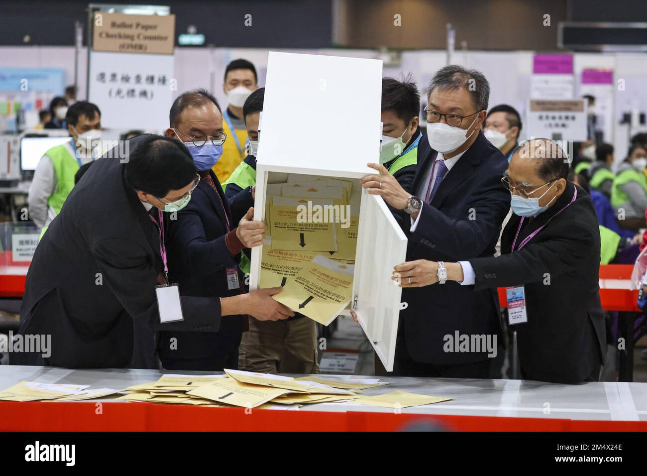 Mr Justice Lok Kai-hong (3rd from left) the Secretary for ...