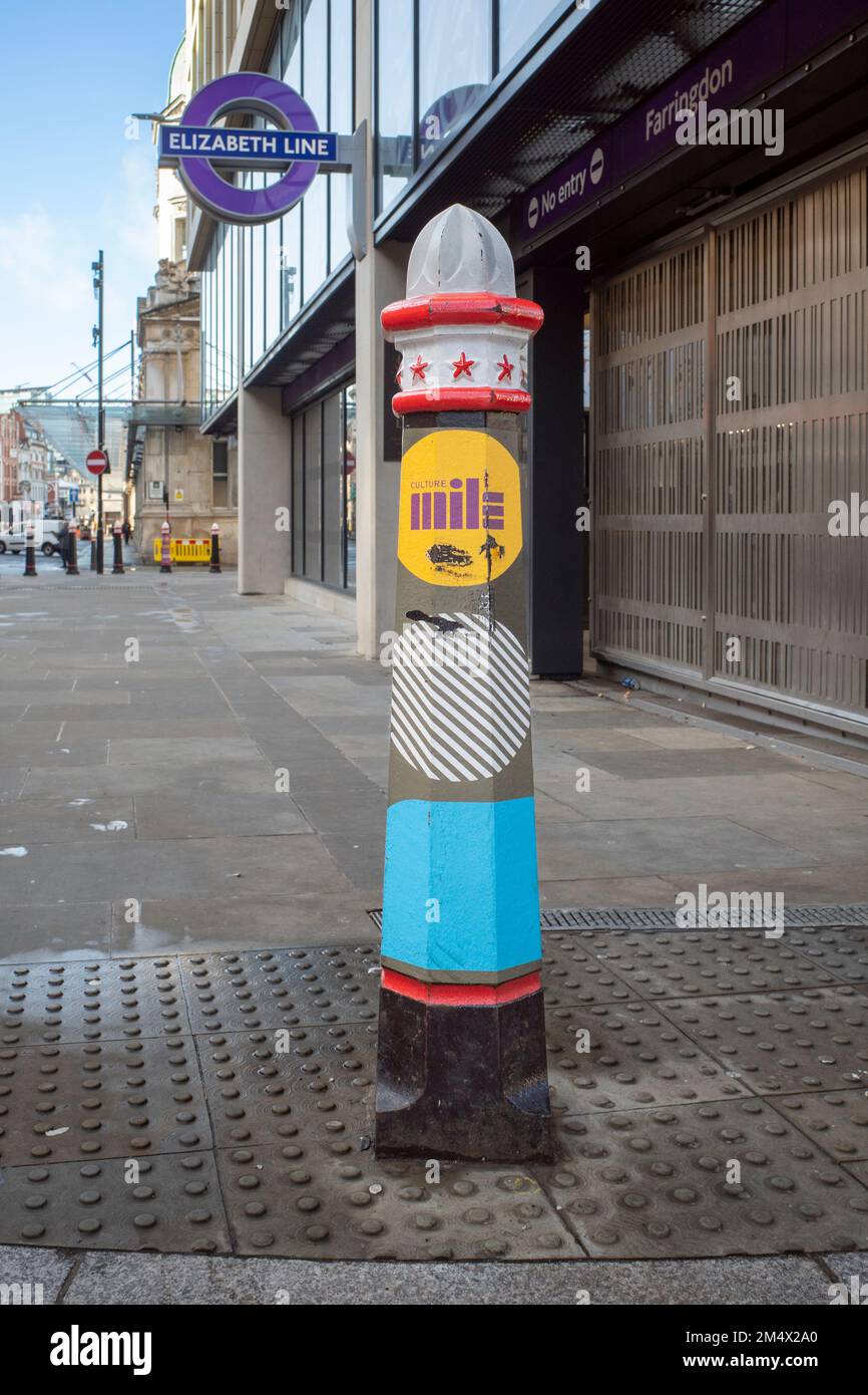 A bollard outside Farringdon Station at the start of the City of London Culture Mile containing ...