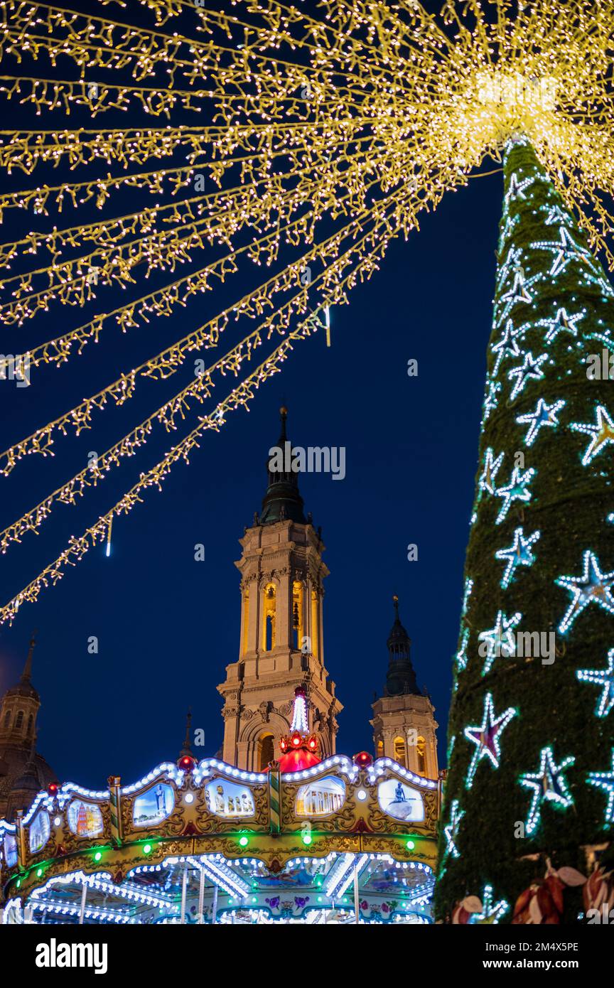Illuminated christmas wish tree in El Pilar square during Christmas ...